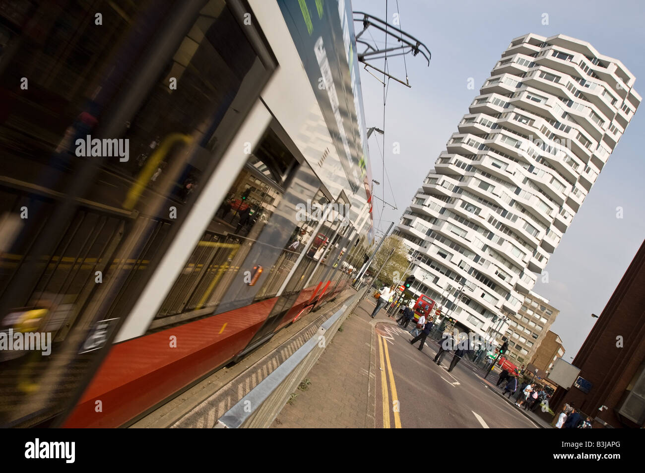 speeding tram in front of number 1 Croydon Stock Photo - Alamy