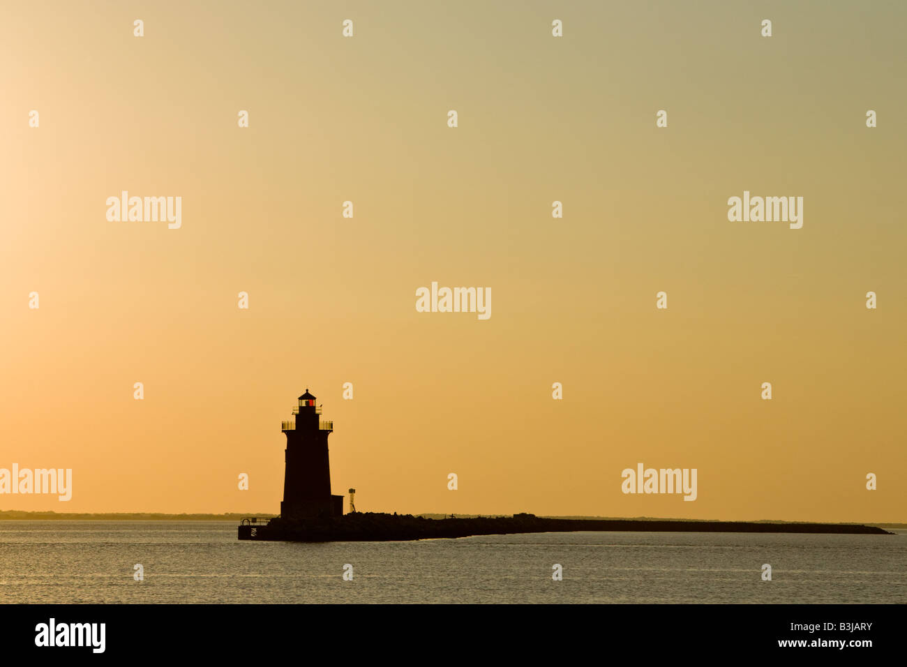 The Breakwater Lighthouse on the Delaware Bay at sunset Stock Photo - Alamy