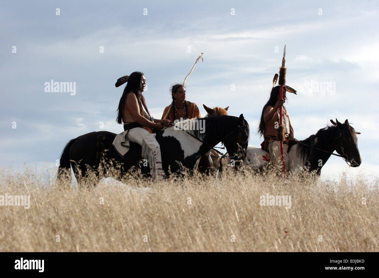 Three Cowboys On Horseback Stock Photos & Three Cowboys On Horseback ...