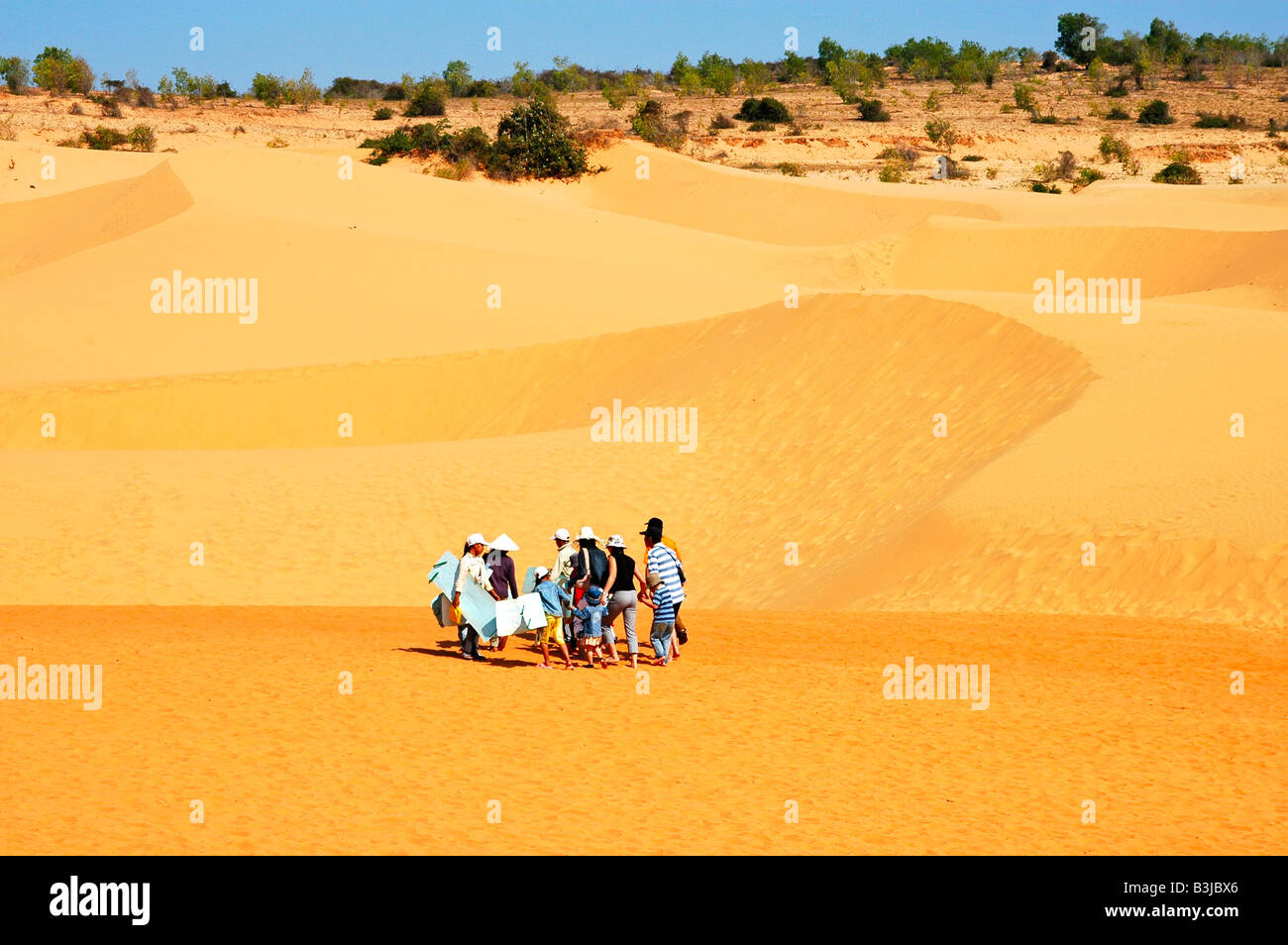 Tourists explore the sand dunes of Mui Ne, Viet Nam Stock Photo - Alamy