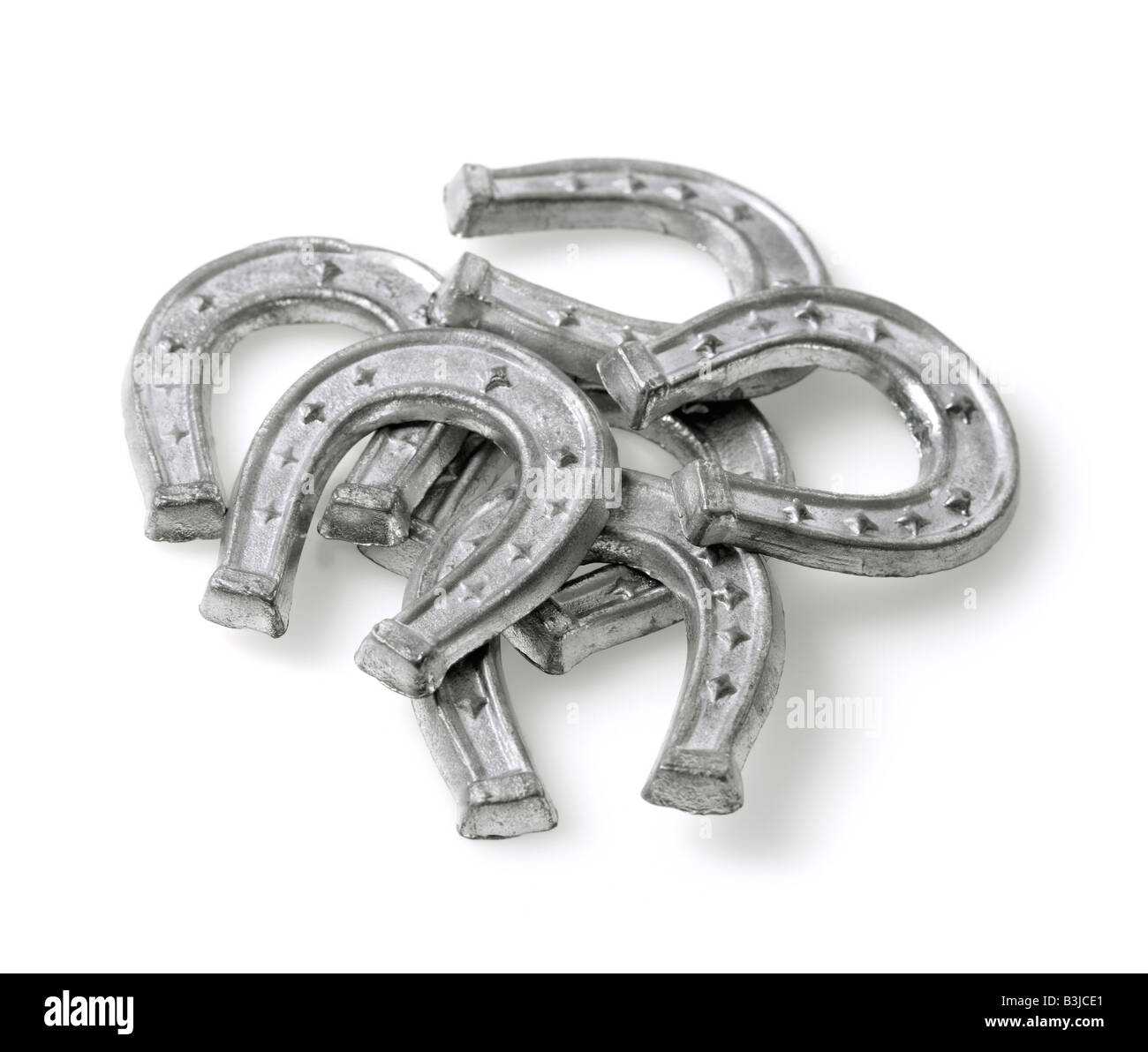 Small horse shoes made of tin used in Finnish new years ritual where ...