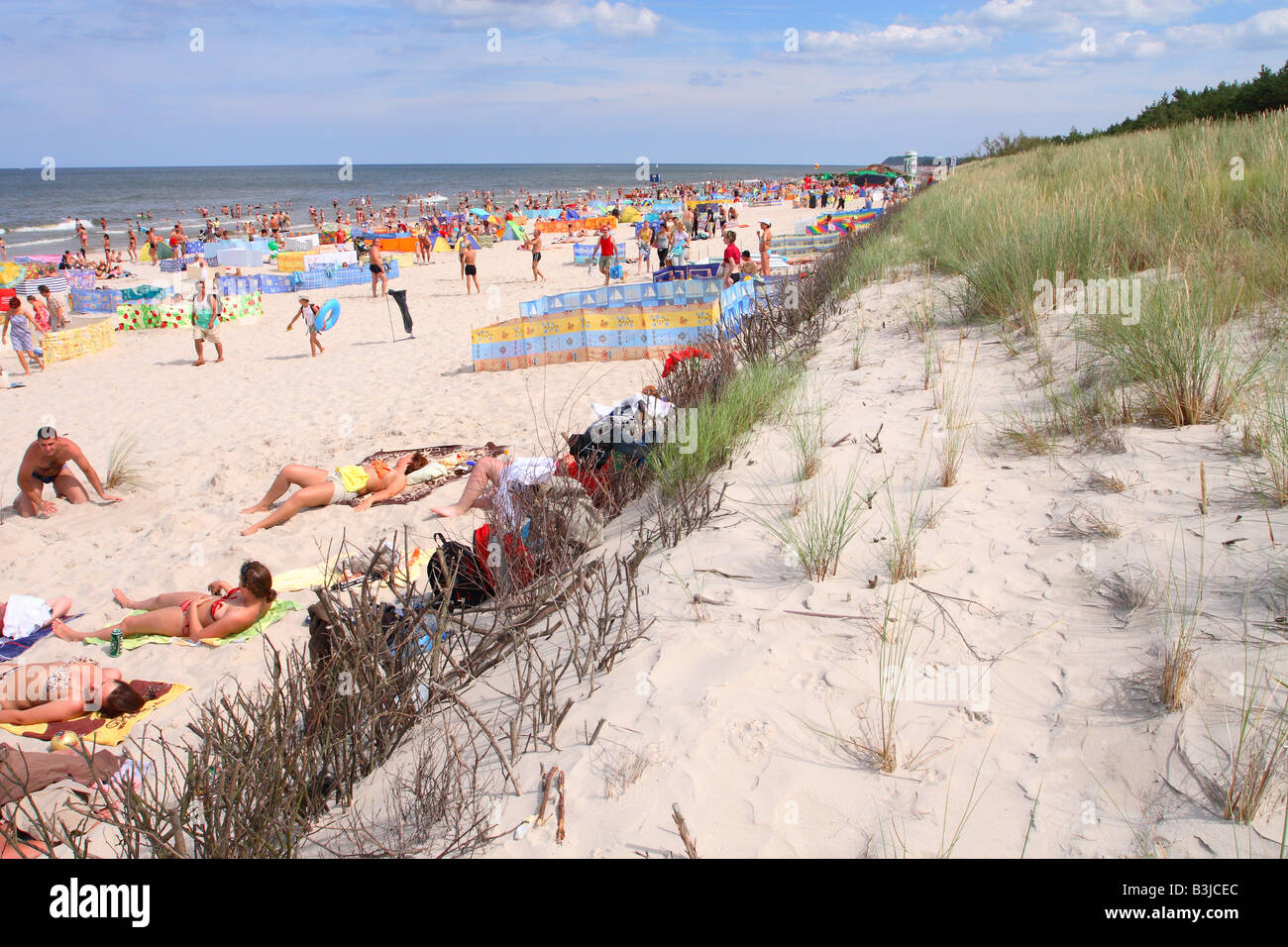 Karwia beach Poland on the Baltic Sea coast tourists and visitors enjoy ...