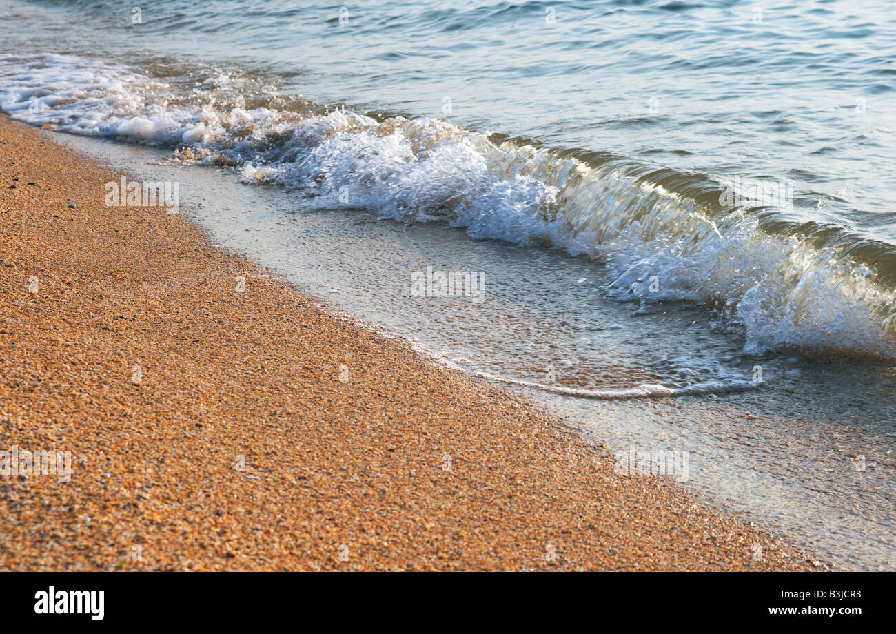 Sea surf wave break on coastline Stock Photo - Alamy