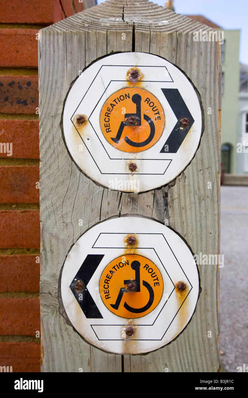 Orange disabled badges marking a wheelchair route Stock Photo - Alamy