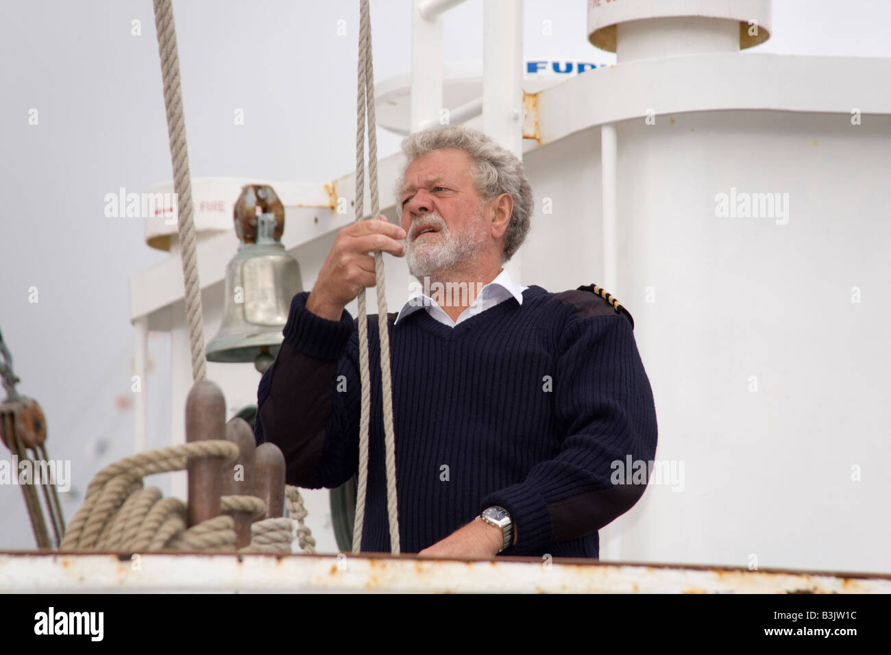 Sailor working on a sailing ship at the Tall Ships race in Liverpool ...