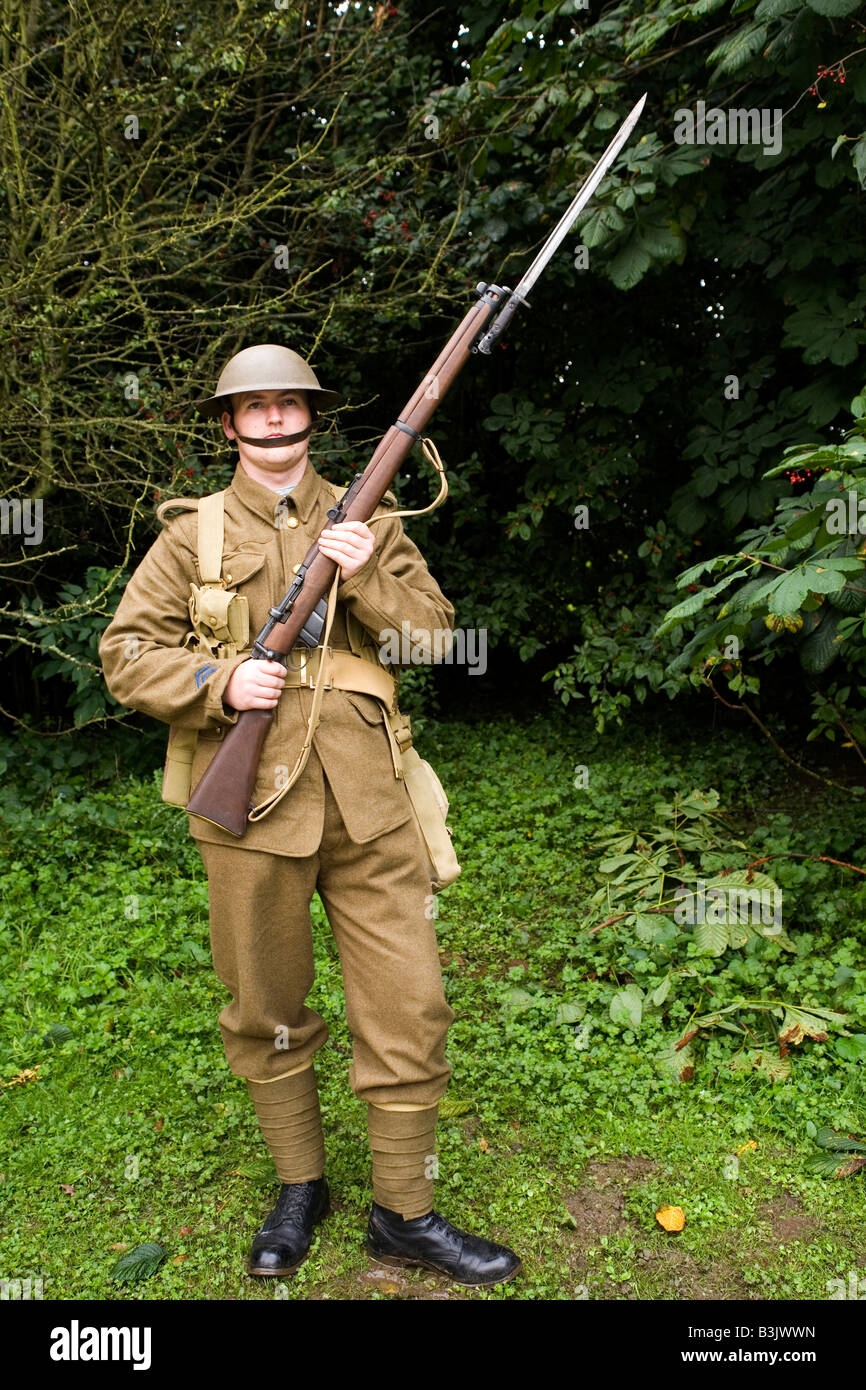 A member of a historical re-enactment society wears the uniforms of a ...