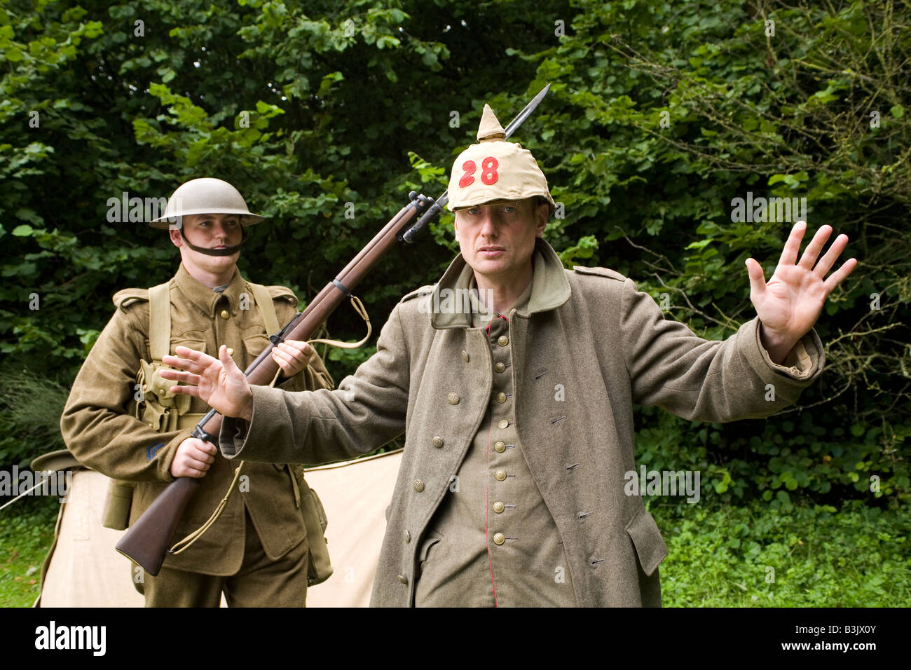 Two members of historical re-enactment societies wear the uniforms of a ...