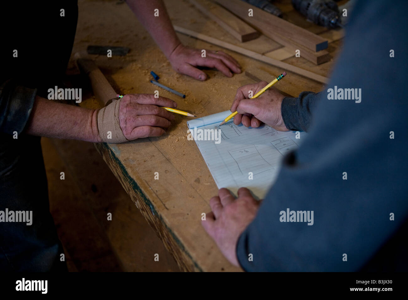 Shipwrights work at the shop in the Port Townsend shipyard The City of ...