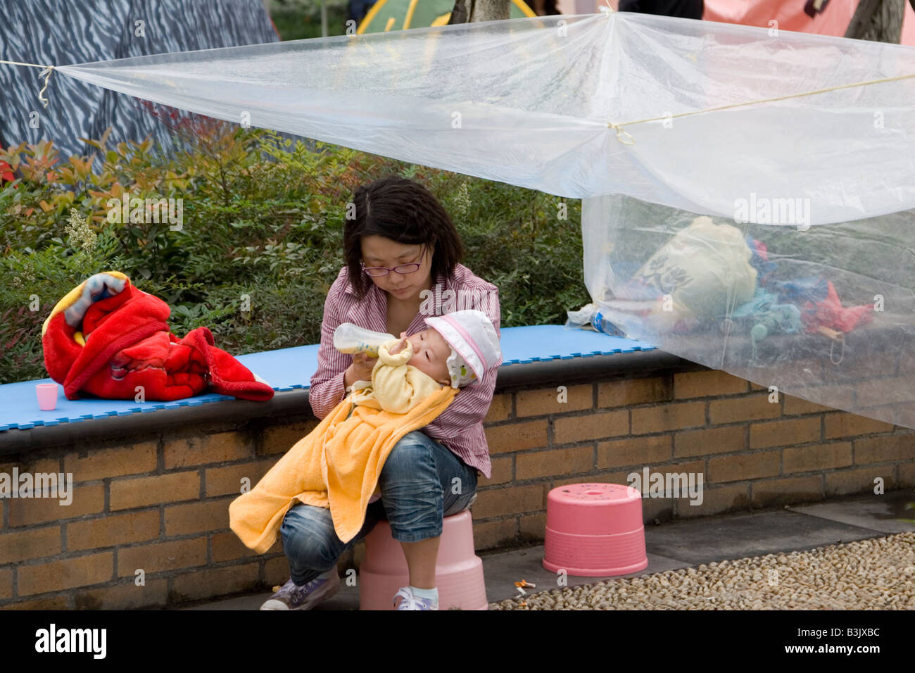 Disaster survivor mother hi-res stock photography and images - Alamy