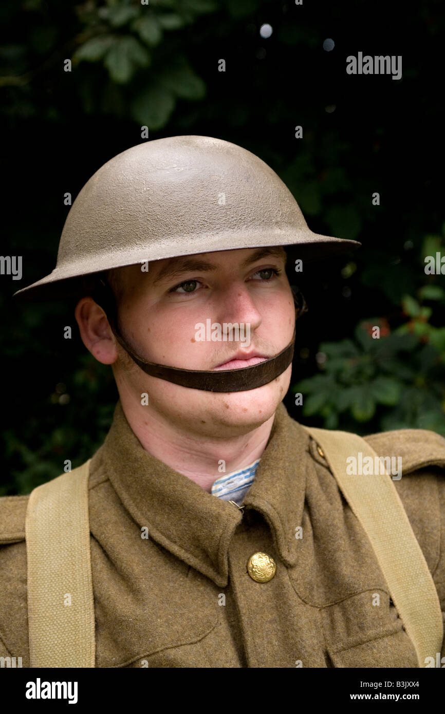 A member of a historical re-enactment society wears the uniforms of a ...