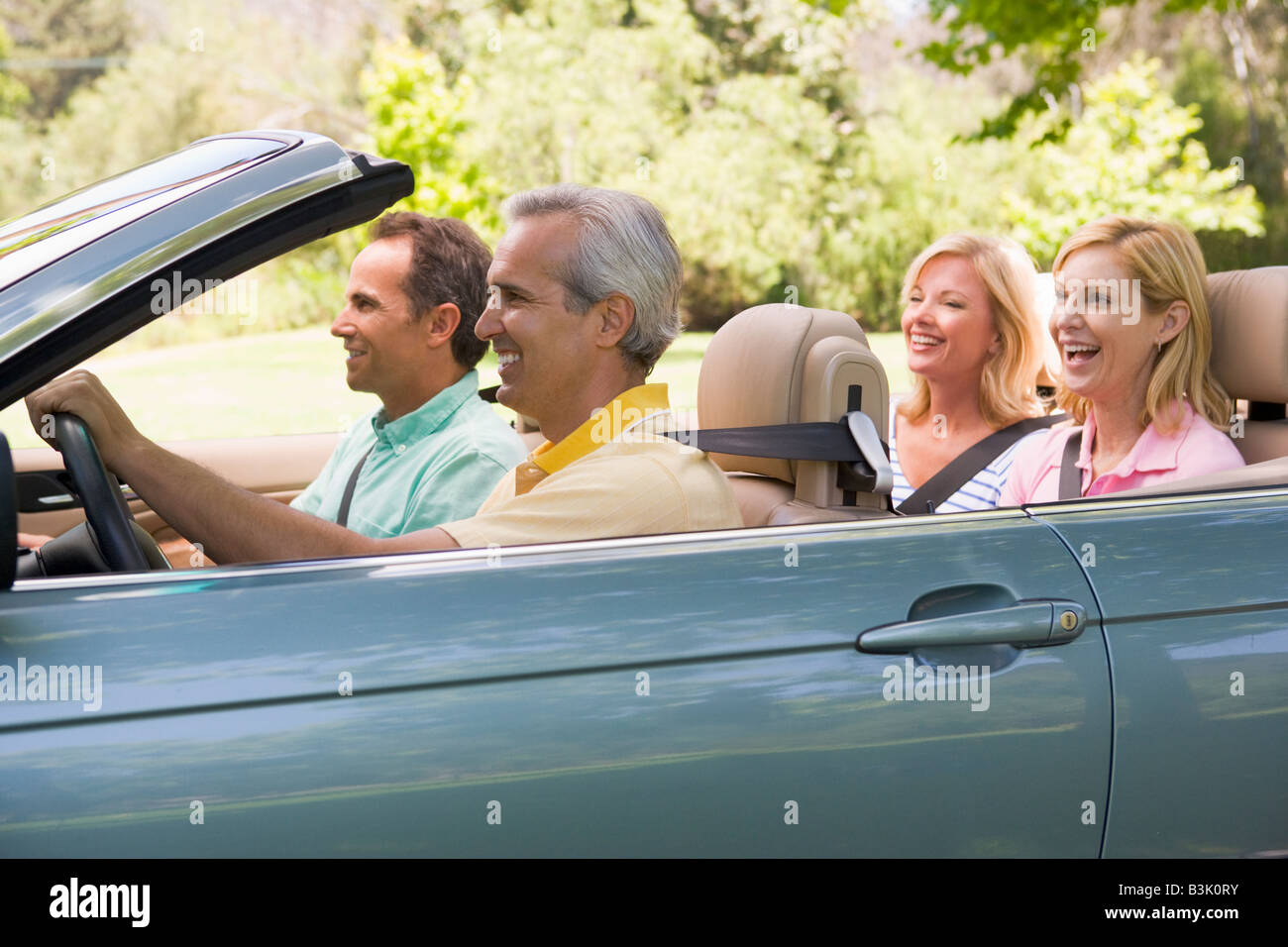 Automobile convertible couples motor hi-res stock photography and ...