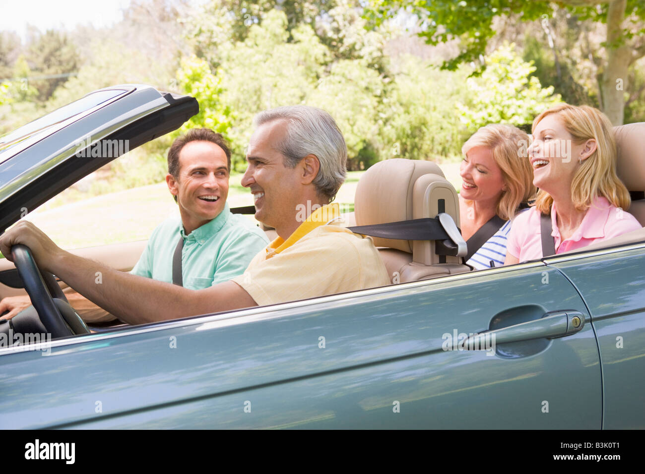 Automobile convertible couples motor hi-res stock photography and ...