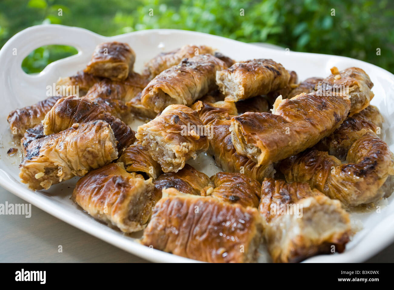 Turkish savory treats A plate full of cooked pastry wrapped savory ...