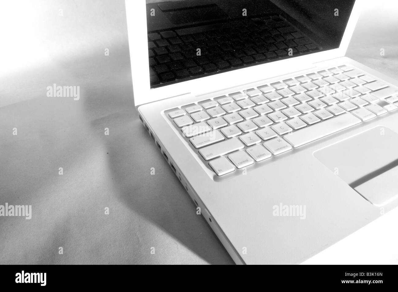 White Apple Macbook laptop computer Stock Photo - Alamy