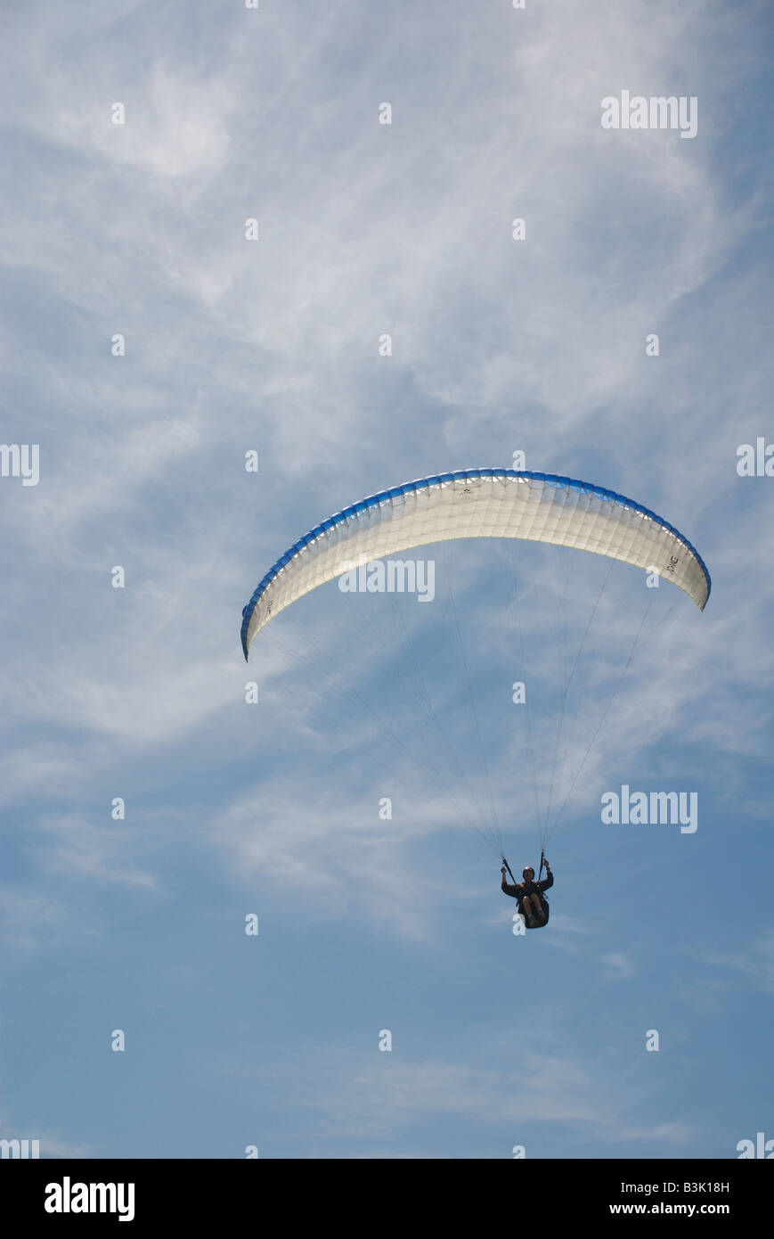 Parascender in mid flight Stock Photo - Alamy