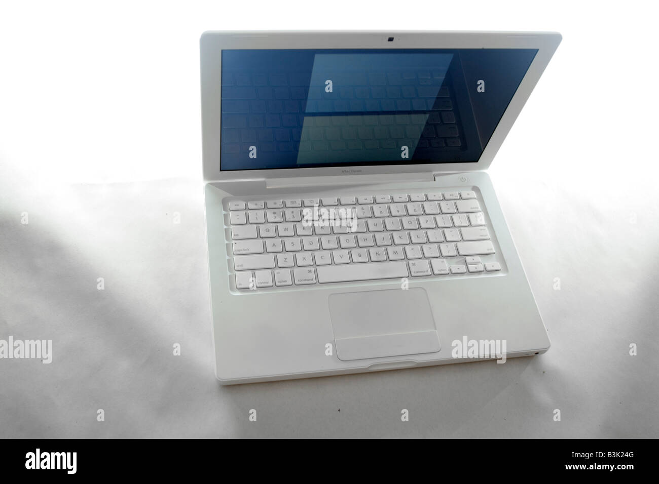 White Apple Macbook laptop computer on white Stock Photo - Alamy