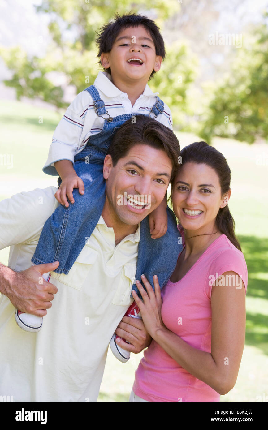 Family outdoors smiling Stock Photo - Alamy