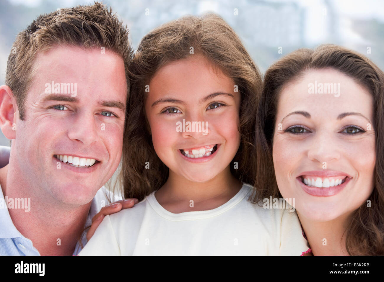 Family outdoors smiling Stock Photo - Alamy