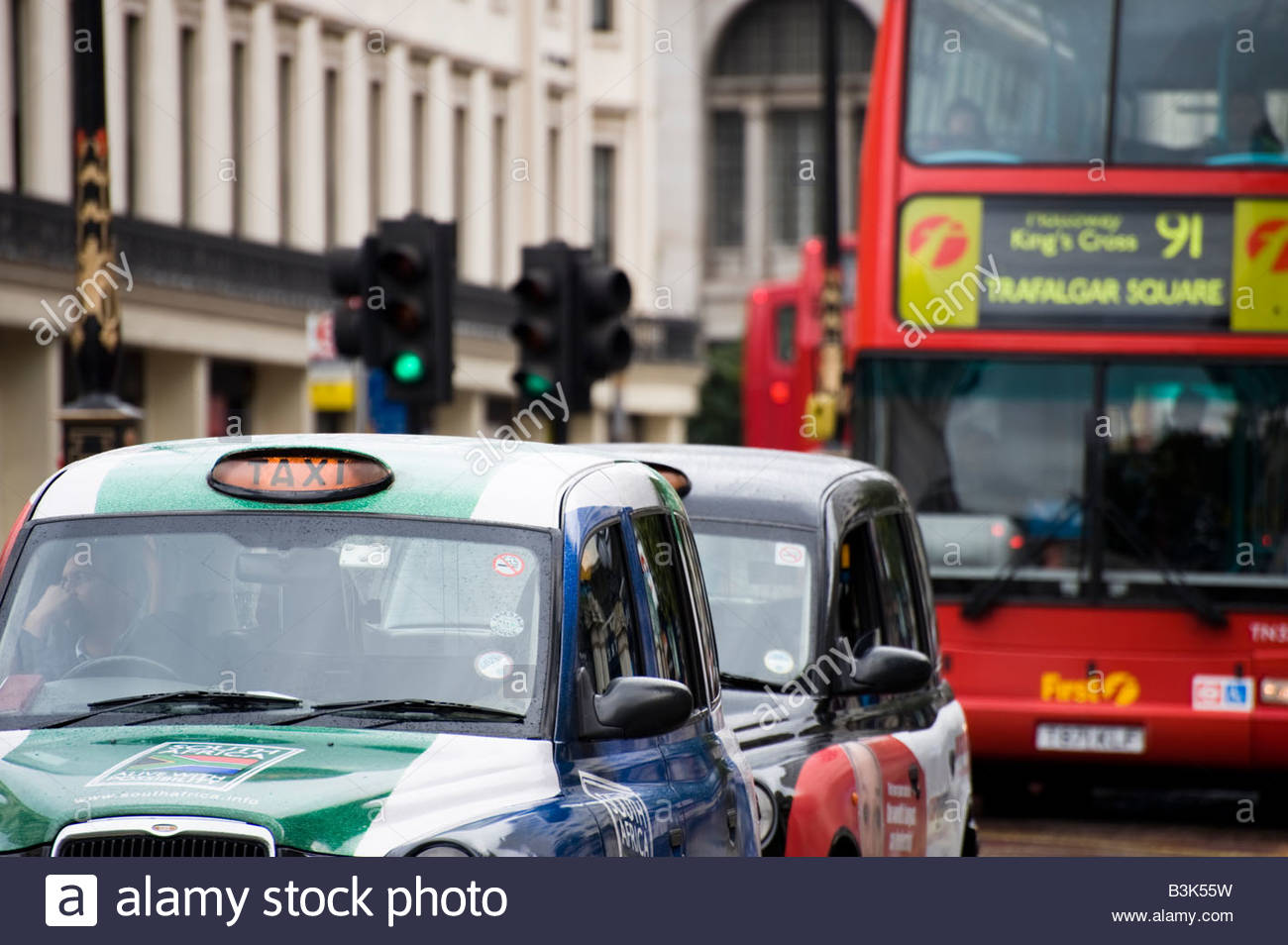 Red London Buses Black Cab High Resolution Stock Photography and Images ...