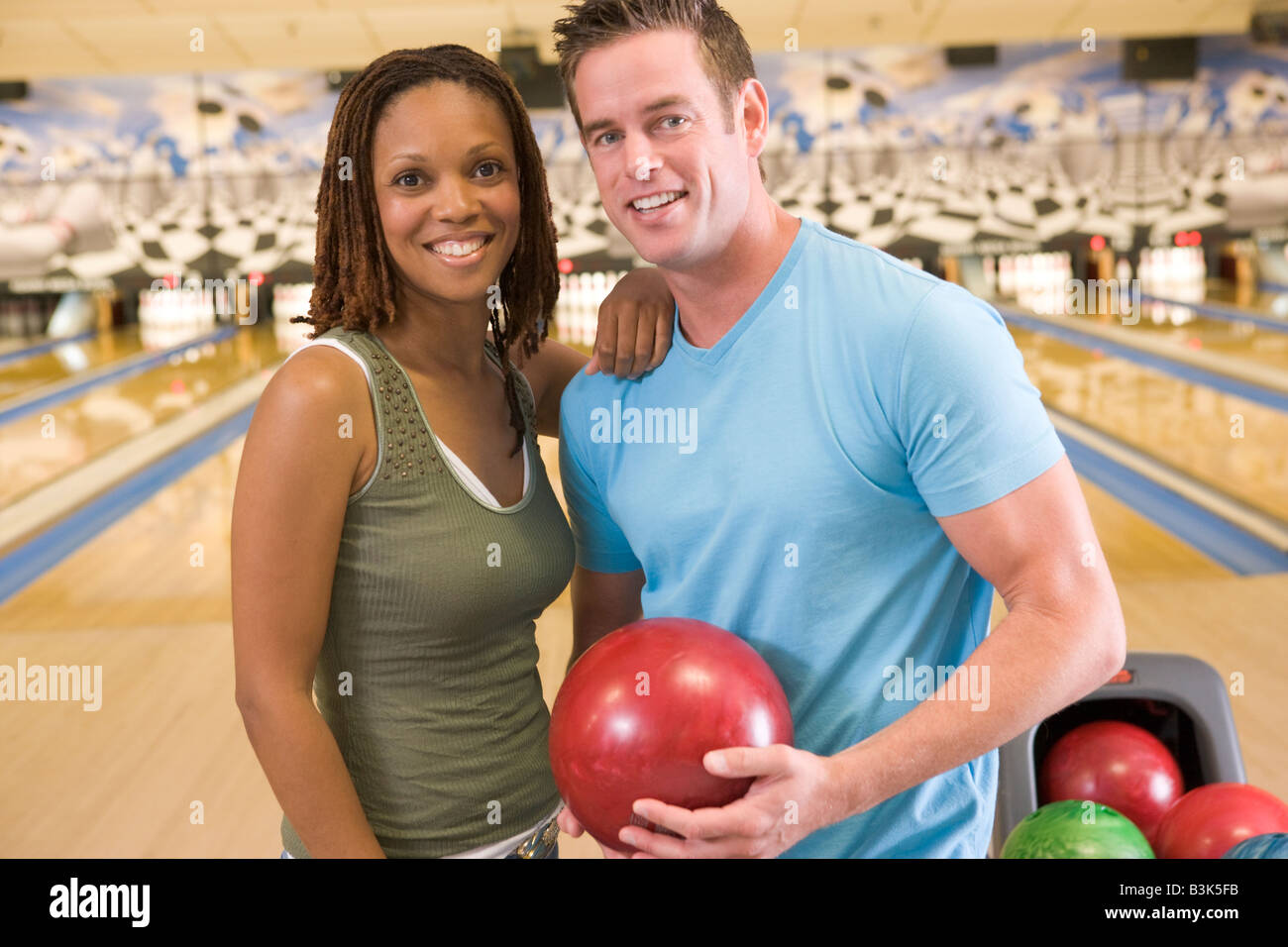 Couple bowling together hi-res stock photography and images - Alamy