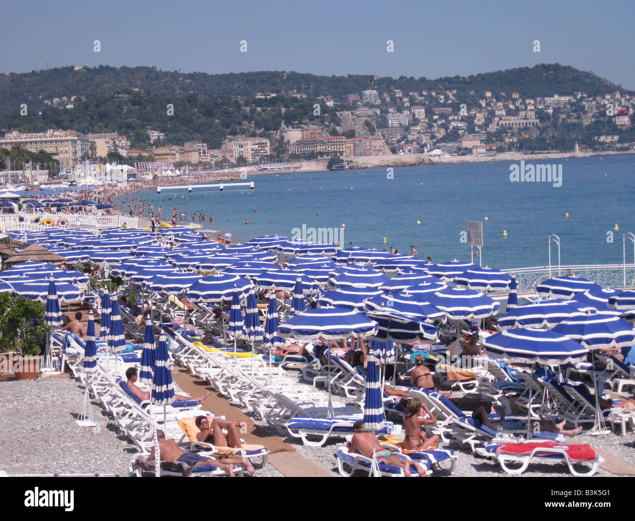 NICE France sunbathing along the Promenade des Anglais Stock Photo - Alamy