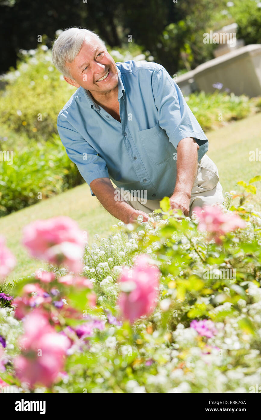 Working in the garden with a trowel hi-res stock photography and images ...