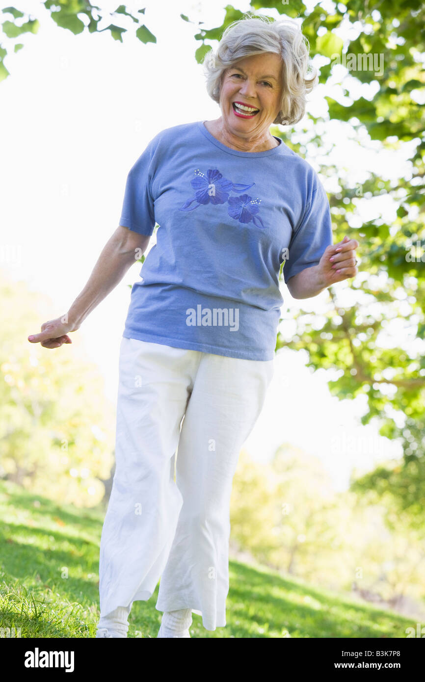 Elderly woman with walking hi-res stock photography and images - Alamy