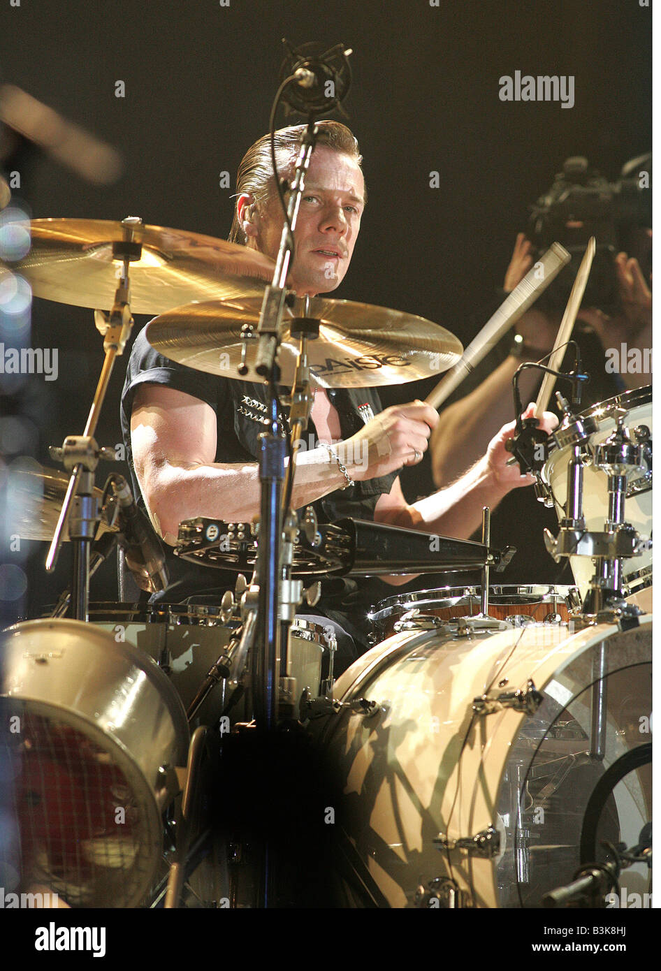 U2 Irish rock group with Larry Mullen in 2005 Stock Photo - Alamy