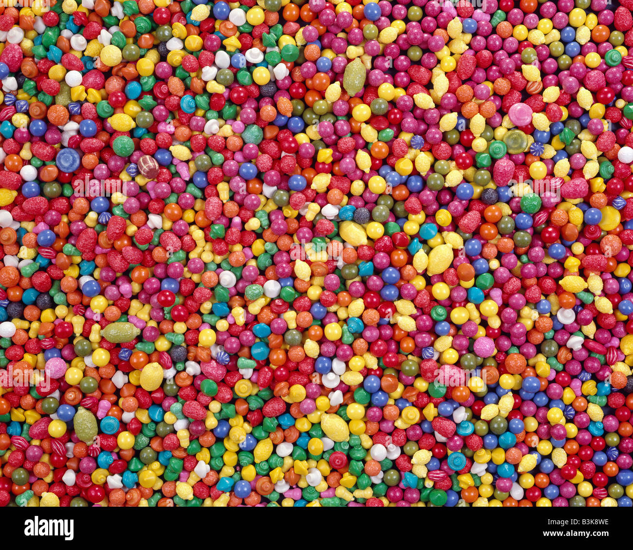 BACKGROUND WITH SOFT-CENTRED SWEETS Stock Photo - Alamy
