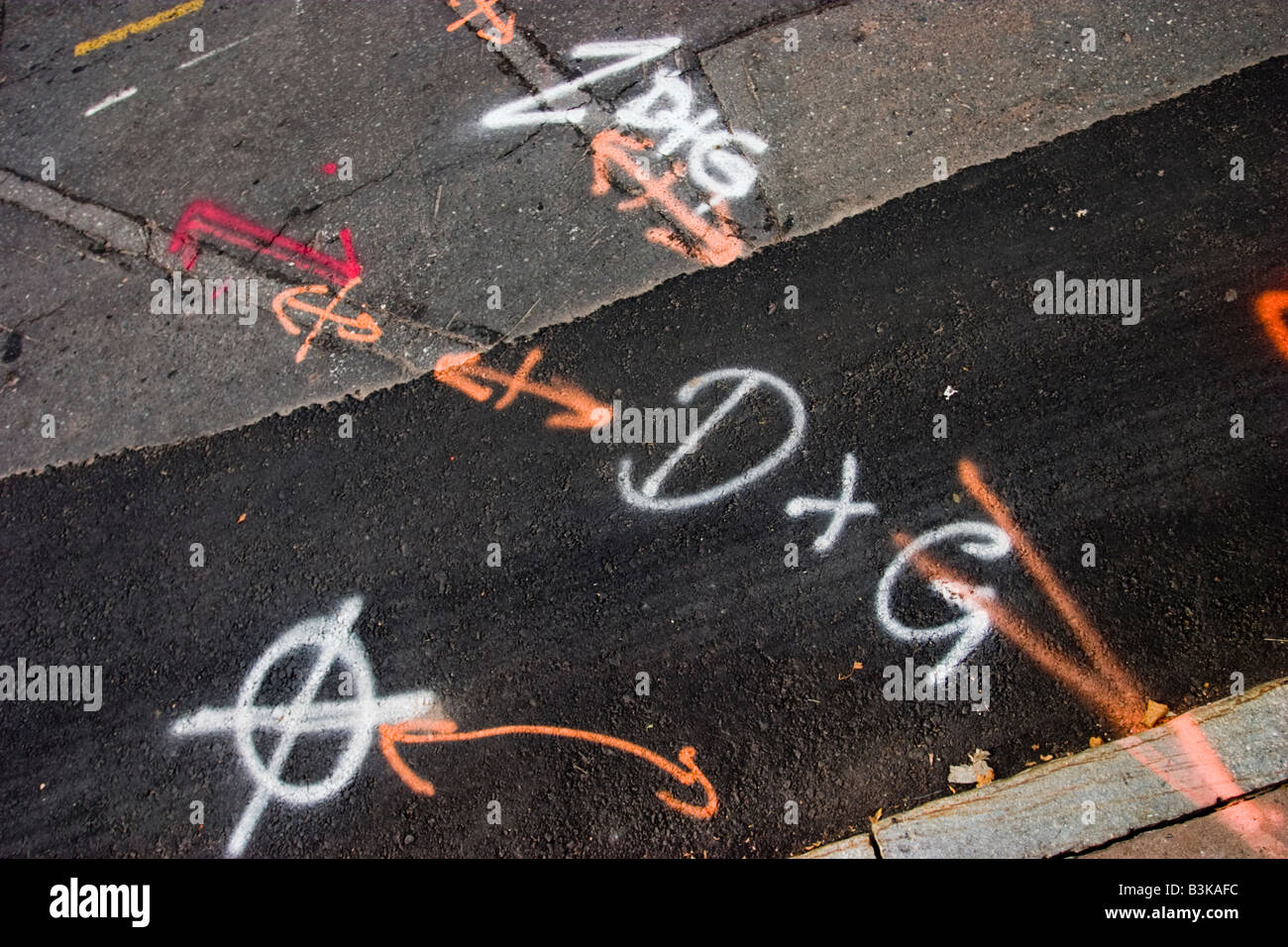 Identification marks painted on a city street Stock Photo - Alamy
