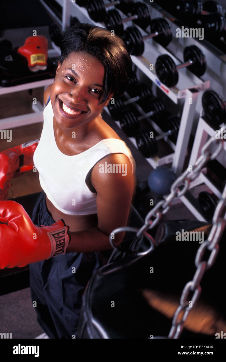 Portrait of a young Black female boxer during her workout Stock Photo ...