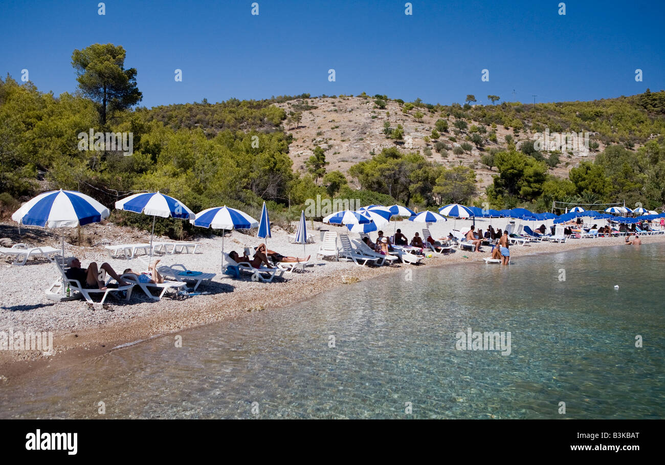 People relaxing on beach, Spetses Greek Islands Greece Stock Photo - Alamy