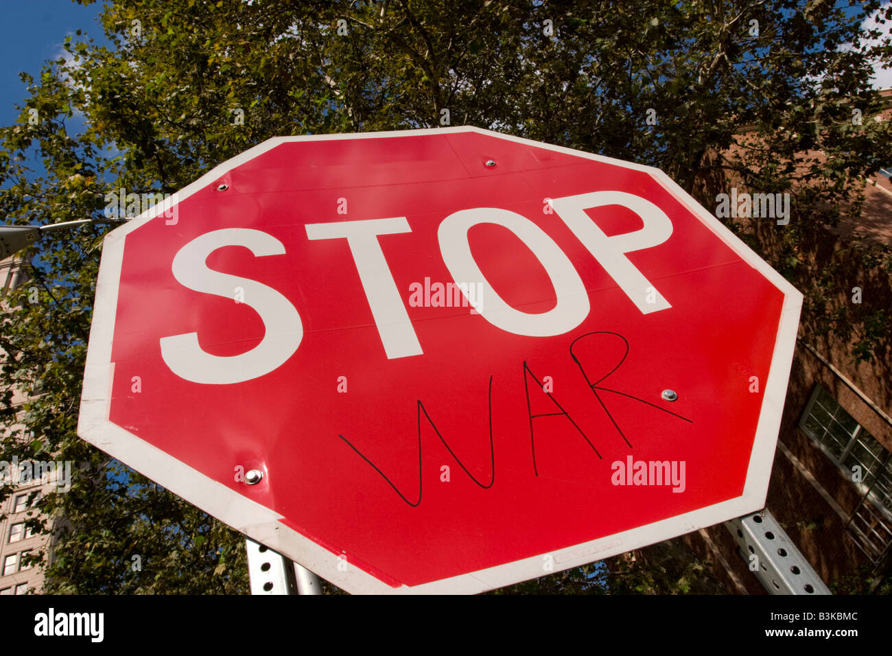Stop sign with the word WAR handwritten below the word STOP Stock Photo ...