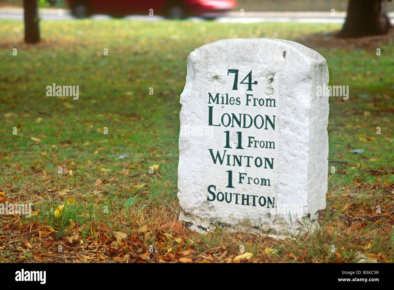 Milestone alongside the A33 road near Southampton with distances to ...