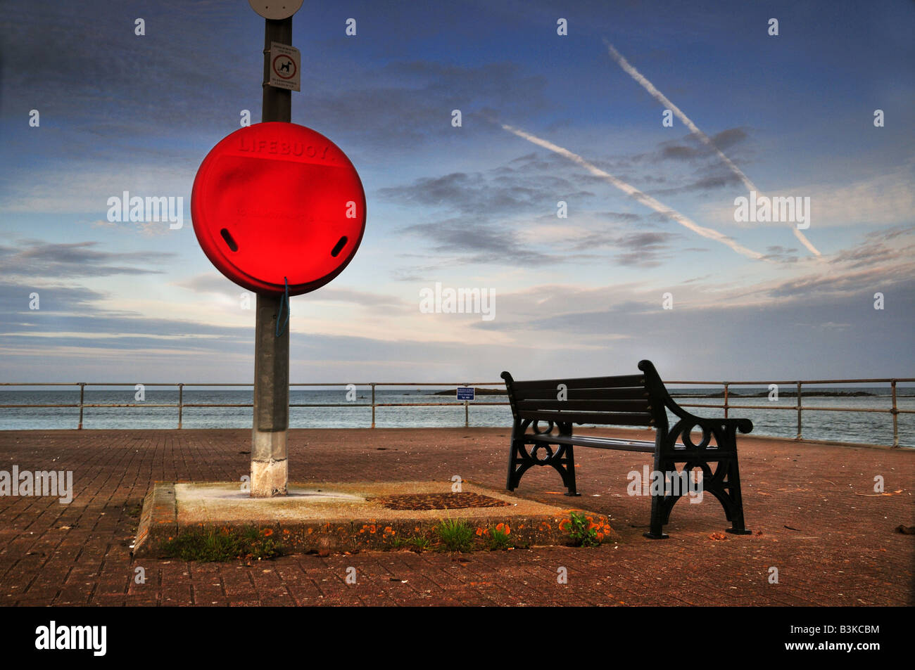 Life buoy and bench on seafront in Millisle, County Down, Northern ...