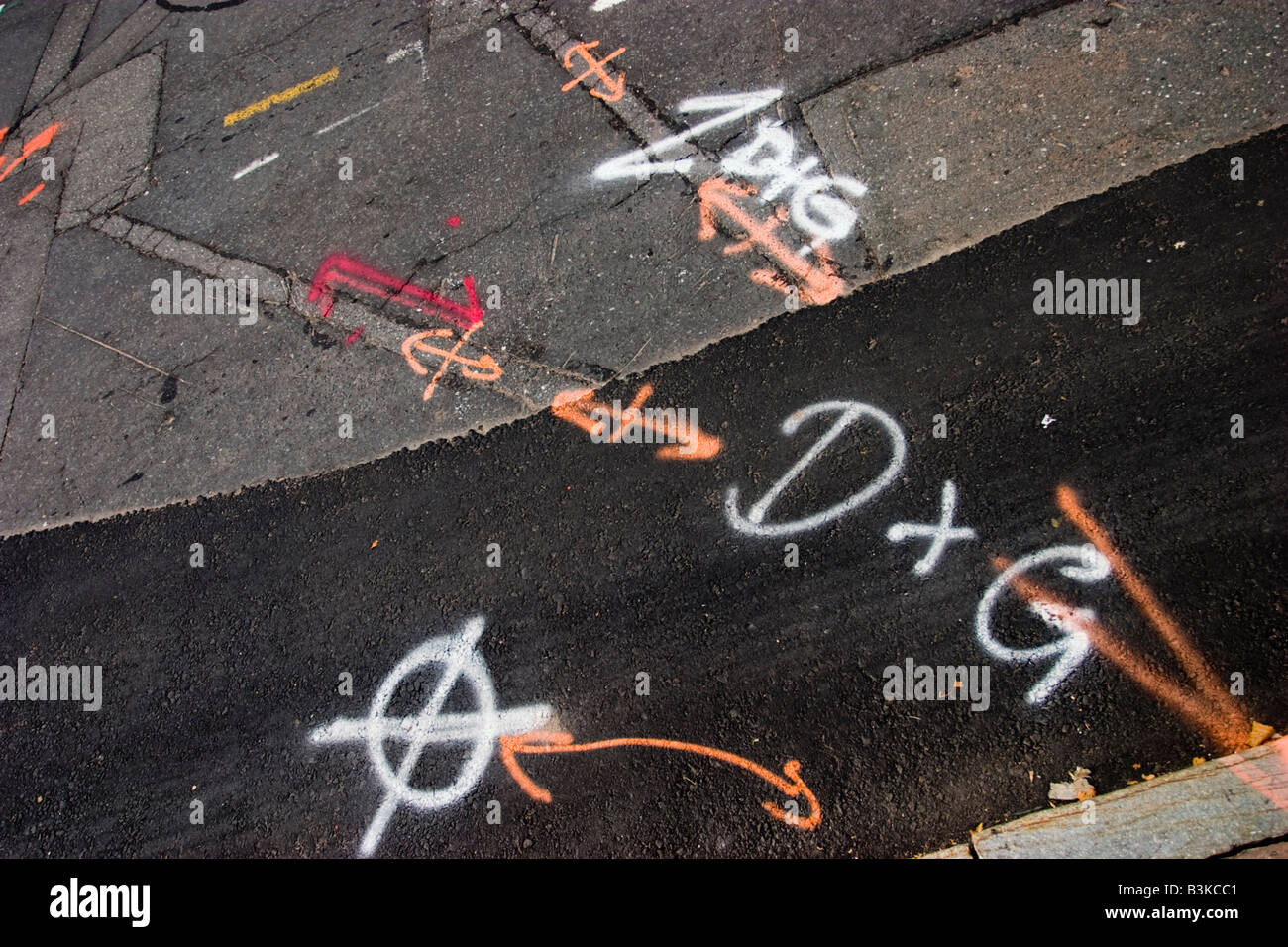 Identification marks painted on a city street Stock Photo - Alamy