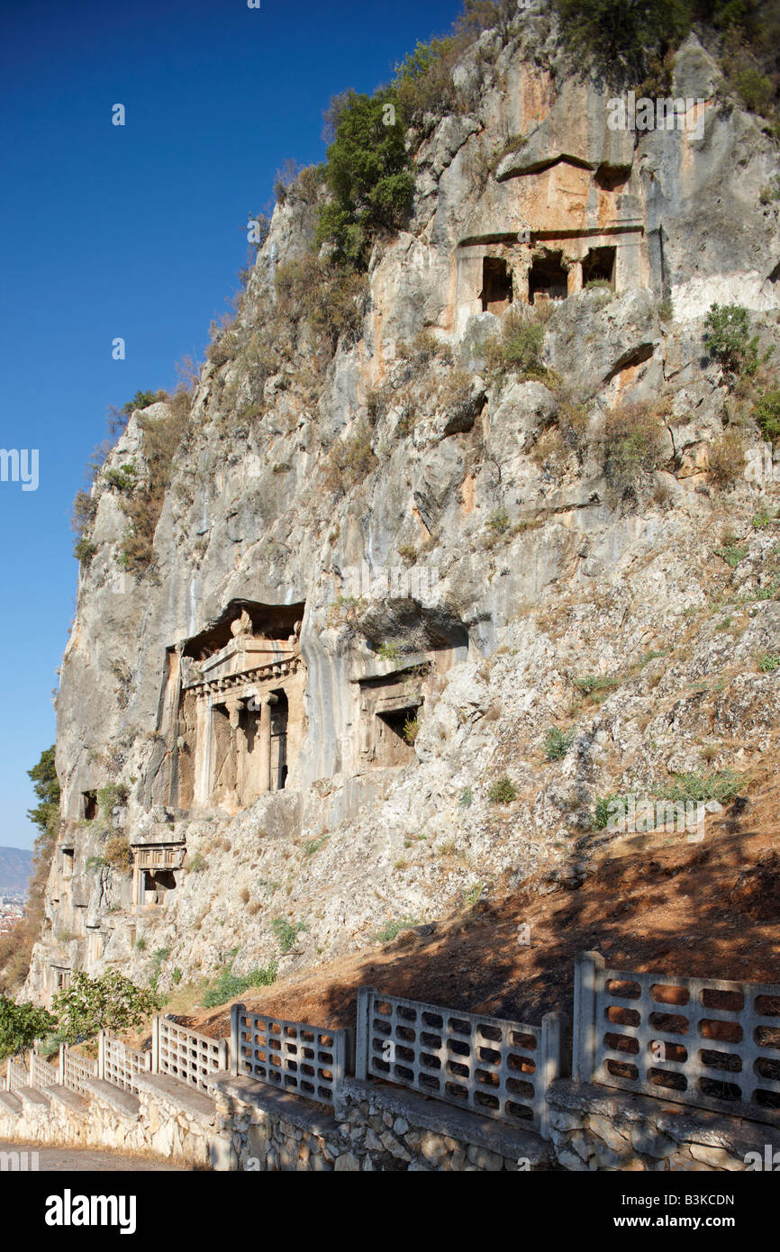 Ancient Lycian rock cut tombs located in modern town of Fethiye ...