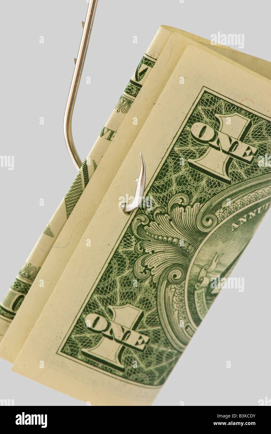 Money on fishing hook Stock Photo - Alamy