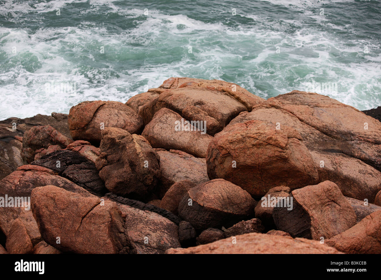 Rocks and waves at kovalam beach,Kerala,India Stock Photo - Alamy