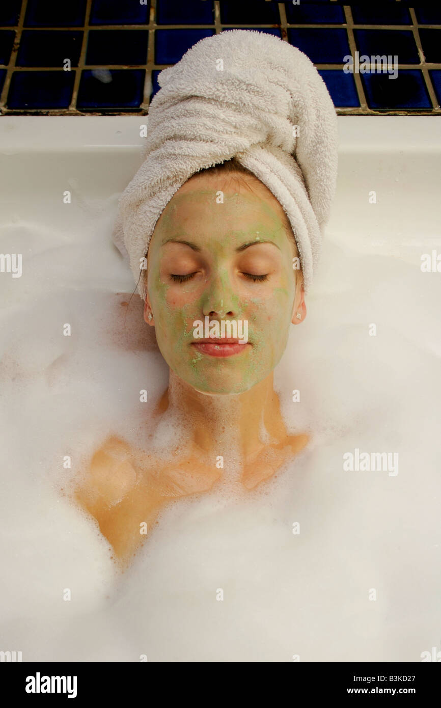 An attractive young lady relaxing in a bubble bath Stock Photo - Alamy