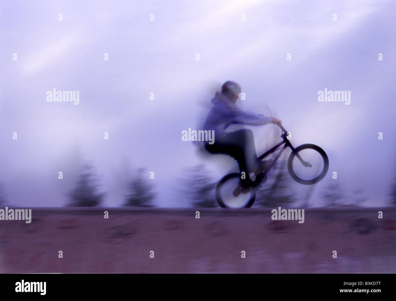 wheeling a bicycle Stock Photo - Alamy