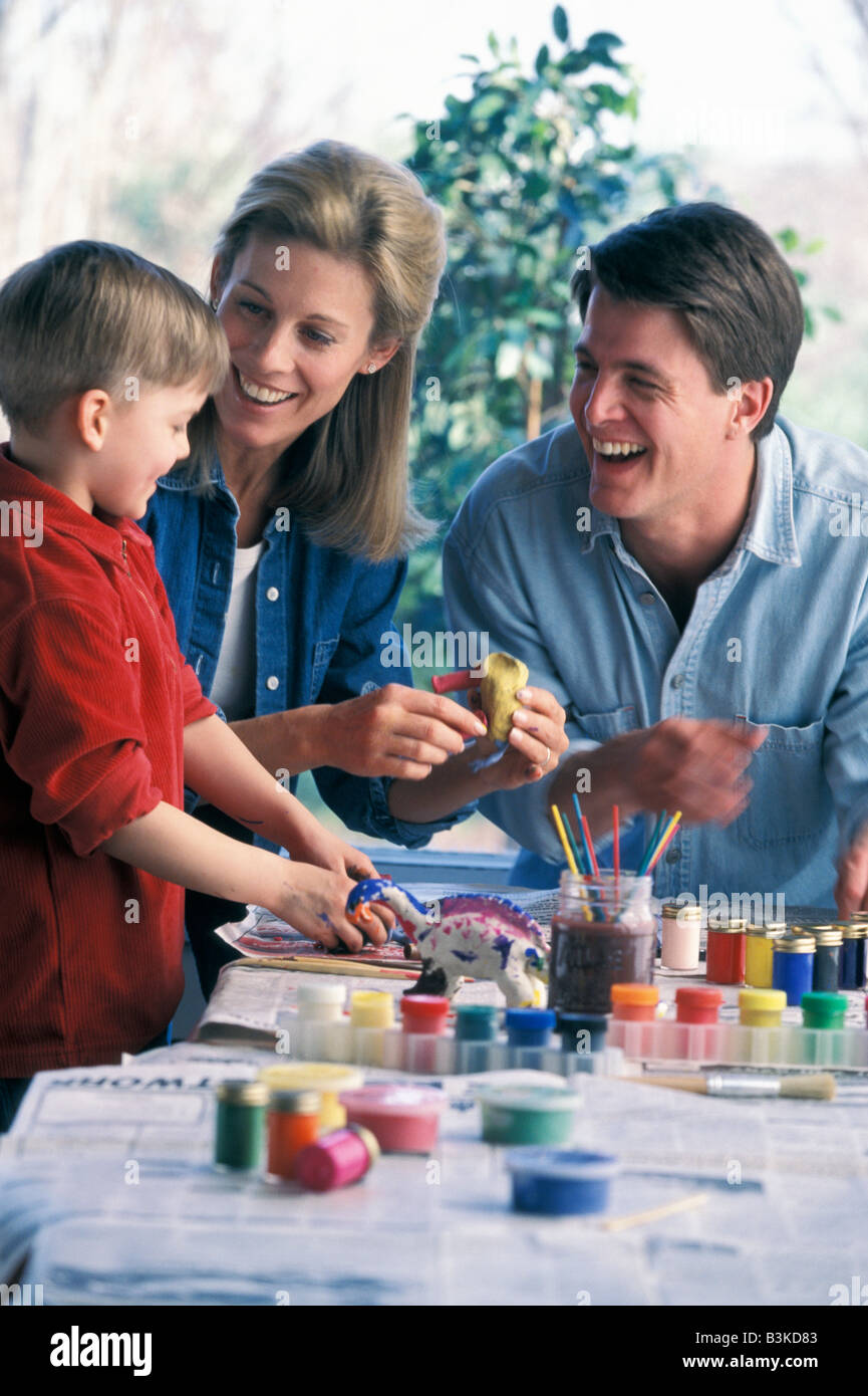 Family working on a craft project together Stock Photo - Alamy