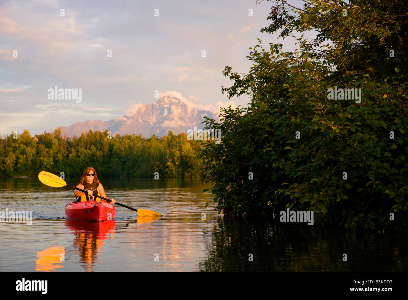 Kayaking on Finger Lake Wasilla Alaska model released Stock Photo - Alamy