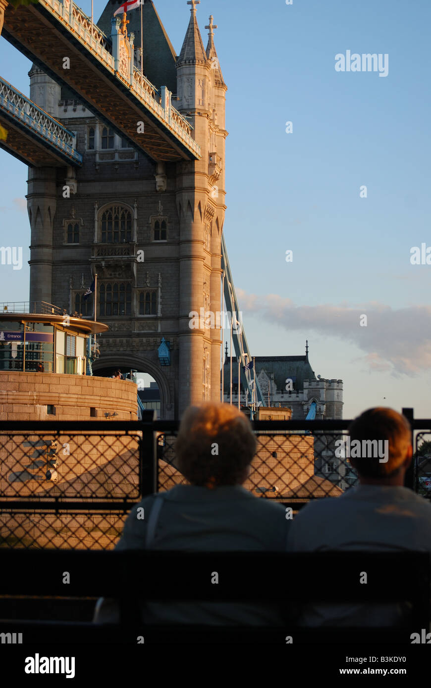 A couple viewing Tower Bridge - Focal point on bridge Stock Photo - Alamy