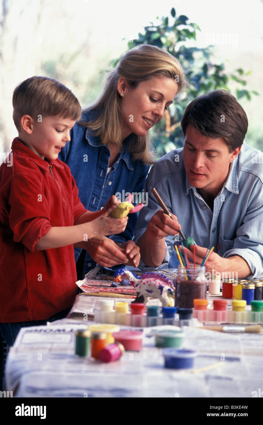 Family working on a craft project together Stock Photo - Alamy