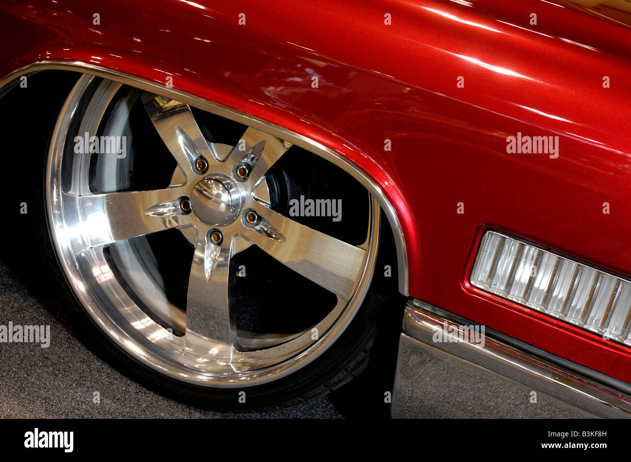 Shiny classic car wheel Stock Photo - Alamy