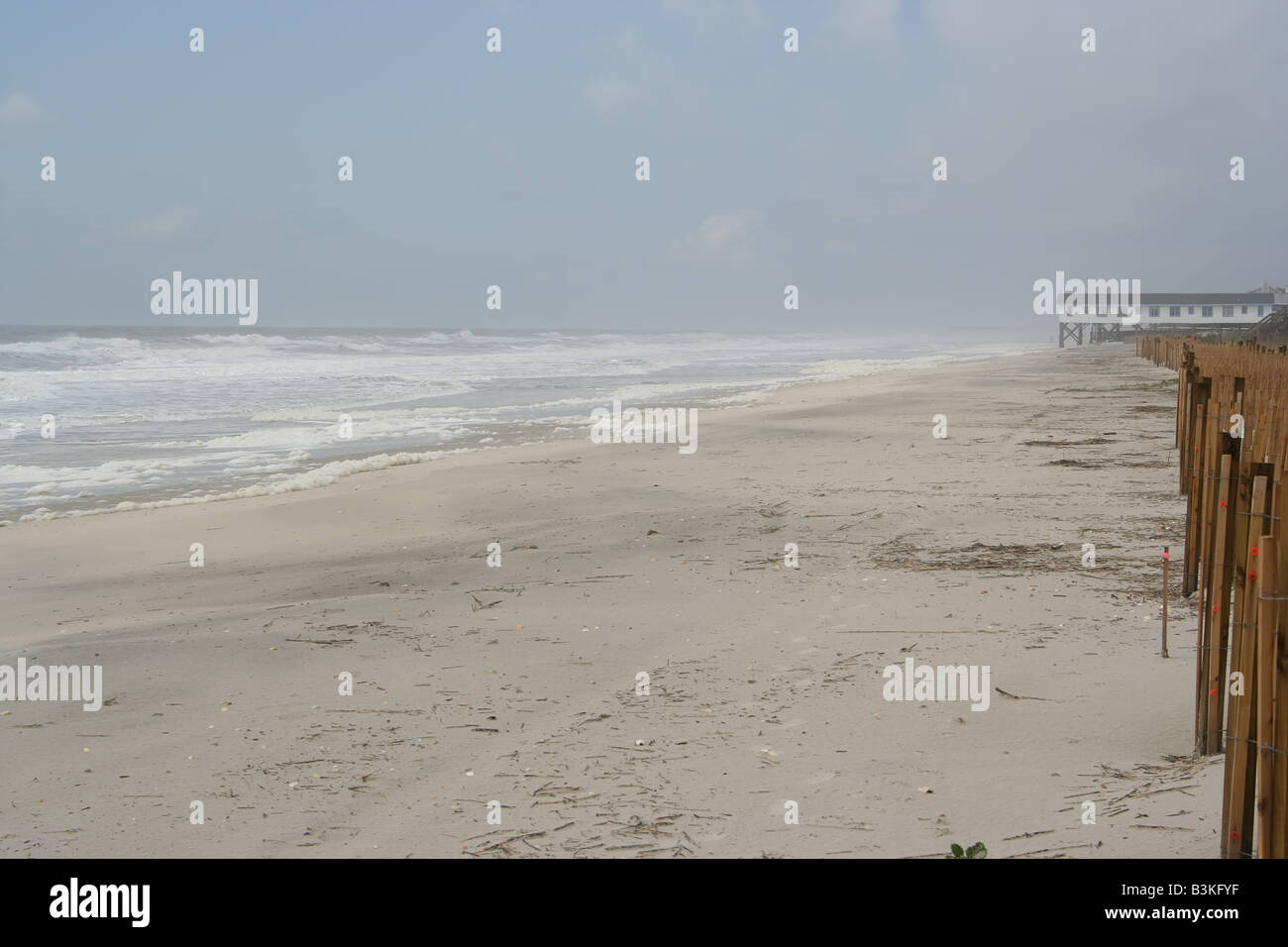 Photograph of large waves crashing on a beach Stock Photo - Alamy