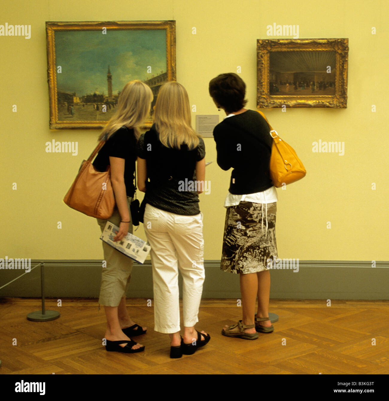 New York City Metropolitan Museum of Art Three People Viewing Painting ...