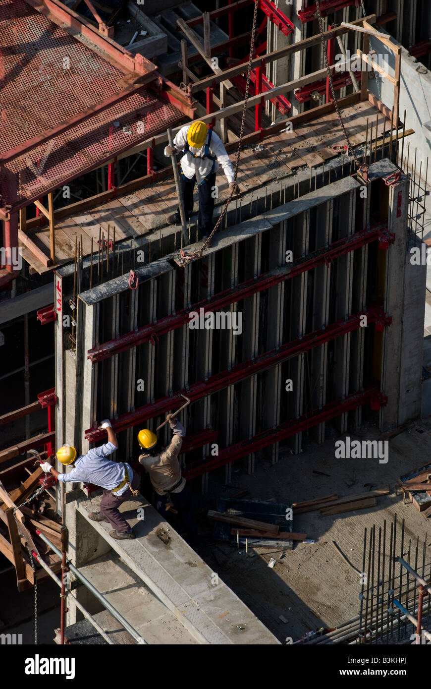 Construction of high-rise apartment building using metal formworks ...