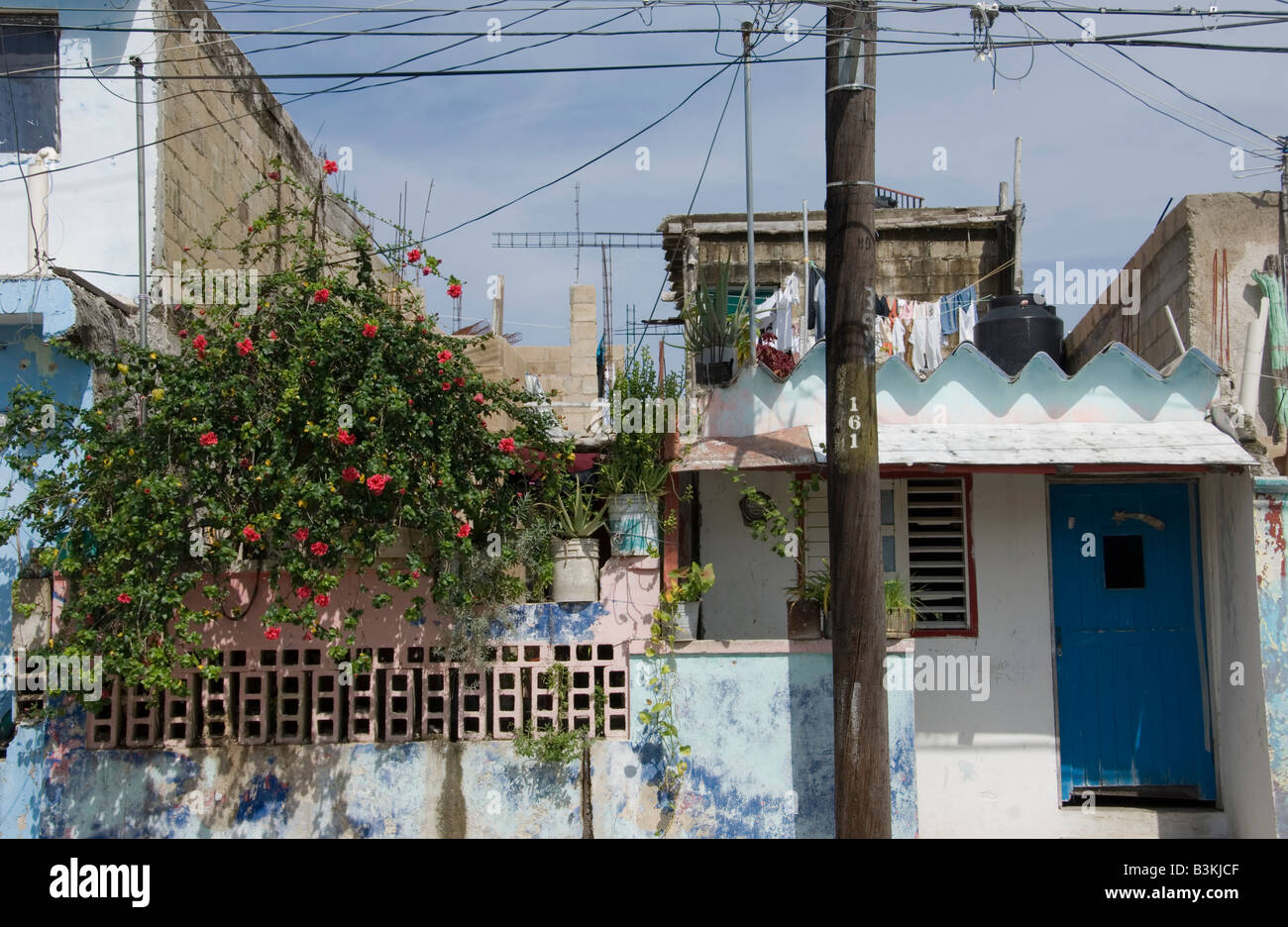 Telegraph Pole & Blue Doorway Stock Photo - Alamy